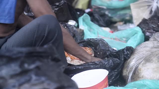 Inside the Filipino slums where locals sell recycled food scraped ...